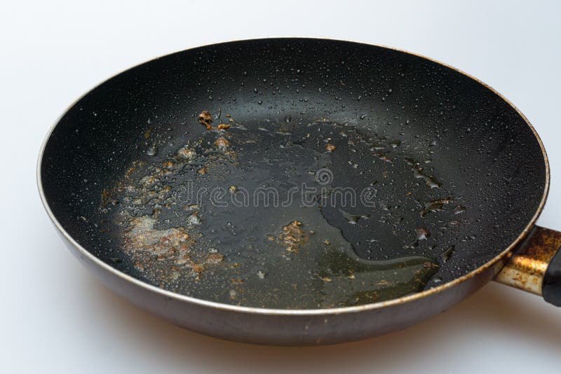 Oiled frying pan stock image. Image of roasted, cooking - 251475159