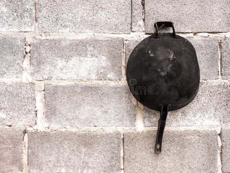 Old Frying Pan Was Burnt Black, Hanging Stock Image - Image of wall ...
