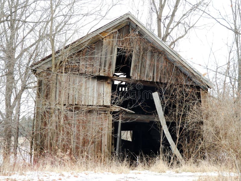Vintage Old Gable Wood Barn Collapses in Winter Woods Stock Photo ...