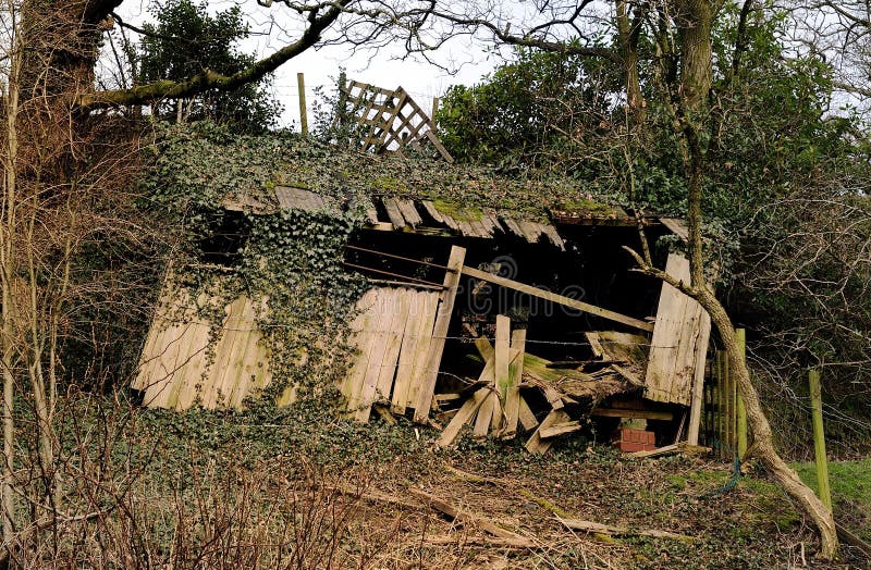 The Old Garage is Falling Down Stock Photo - Image of overgrown ...