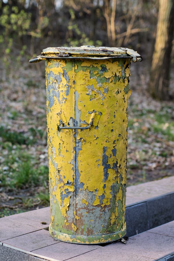 An Old Garbage Bin. Waste Trash Cans Set in a Park between Trees Stock ...