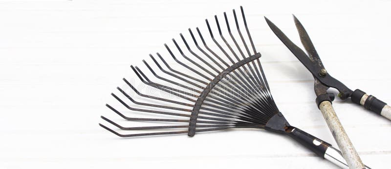 Old Gardening Tools: Garden Rake and Pruner Stock Photo - Image of ...