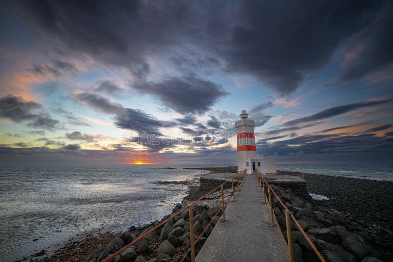 The Old Gardur Lighthouse at Sunset, Iceland Stock Image - Image of ...