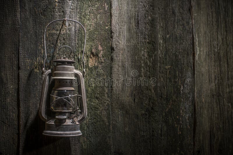 Old gas lantern on wood stock image. Image of burn, lantern - 50745443