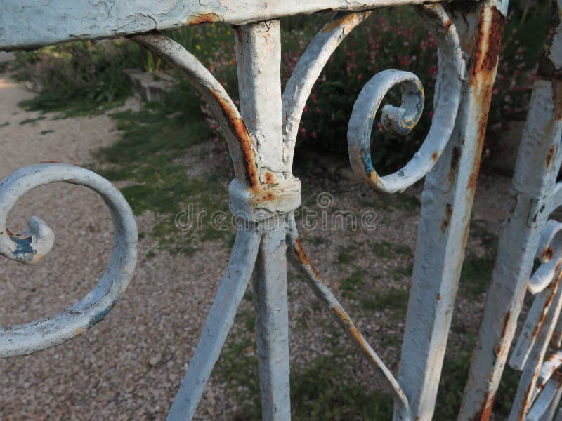 A gate with a lot of rust stock photo. Image of iron - 143503922