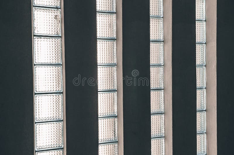 Old Glass Wall Blocks in the Wall of a Soviet-style House. Scattered ...
