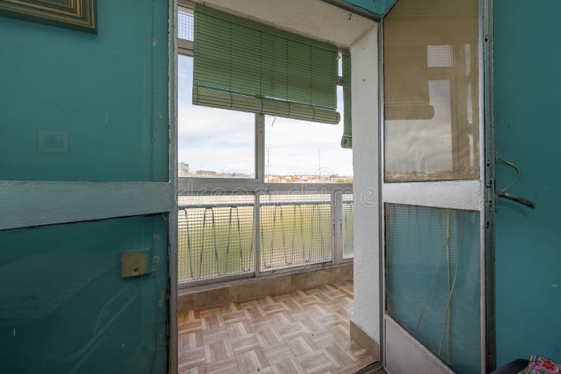 Old Glazed Terrace of an Old House with Sintasol Floors and Roller ...
