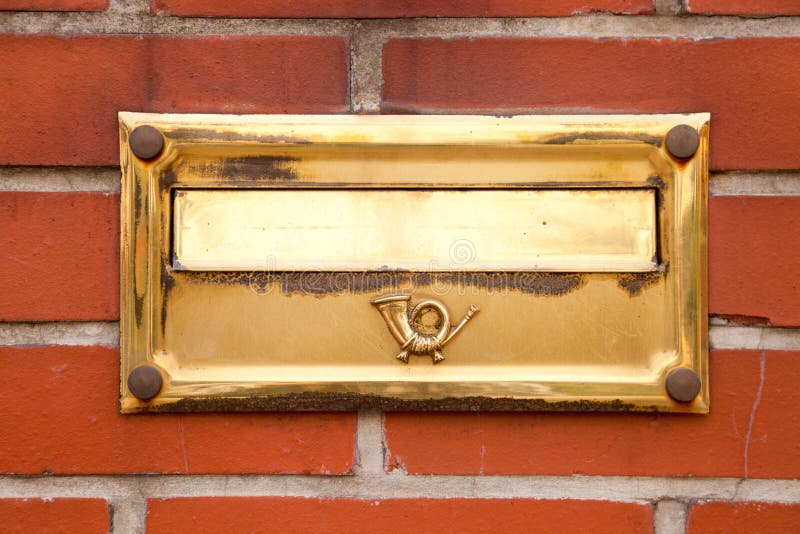Old Gold Post Box on Brick Wall Stock Photo - Image of aged, post: 22372036