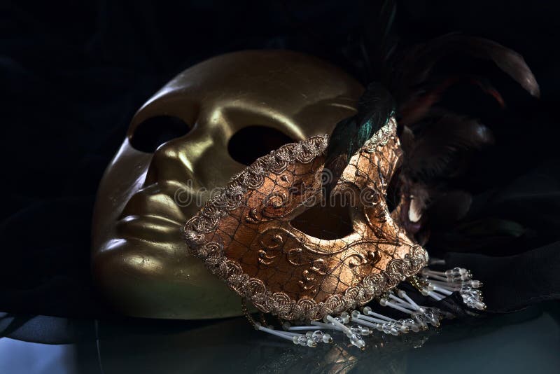 Old gold Venetian masks stock image. Image of feather - 36381269