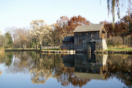 Old Grain Mill in Autumn stock image. Image of pond, water - 1992849