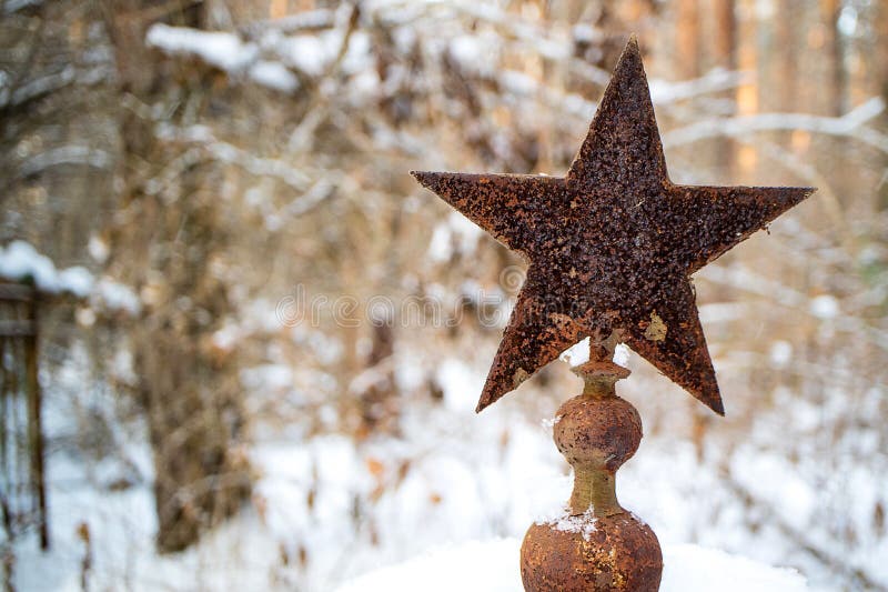 On the Old Grave an Old Rusty Star of the Soviet Period, the Red Army ...