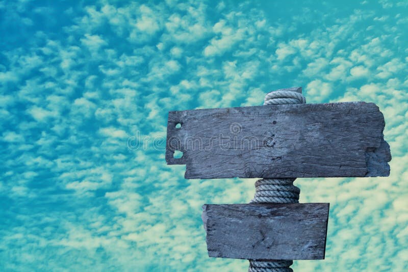 Old Gray Wooden Sign with Blue Sky Background Stock Image - Image of ...
