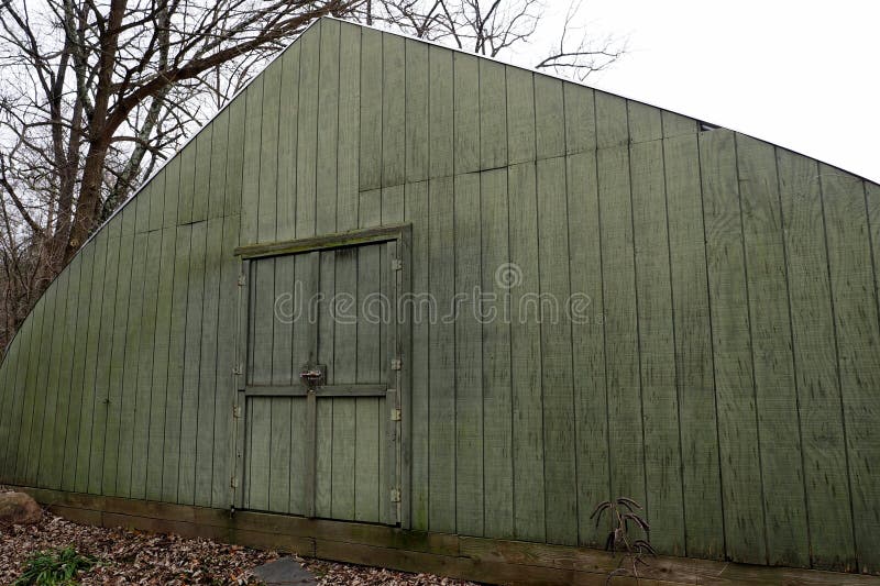The Old Green Building is Used As a Storage Facility. Stock Photo ...