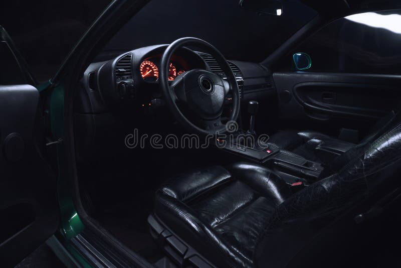 Old Green Car Inside with Shabby Leather Interior with Red Stock Image ...