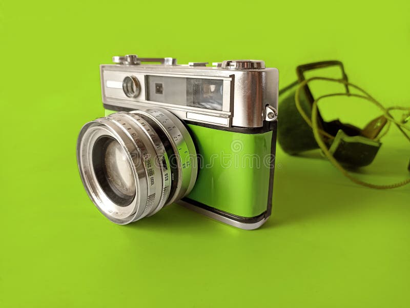 Old green film camera stock photo. Image of equipment - 299647786