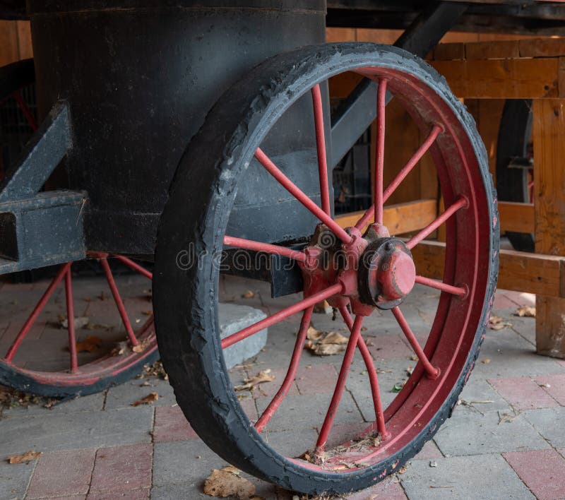 Old grungy red wagon wheel stock photo. Image of tire - 255817492