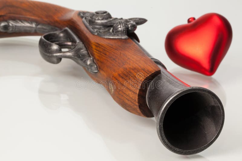 Old gun and red heart stock image. Image of amour, ravaged - 36671835