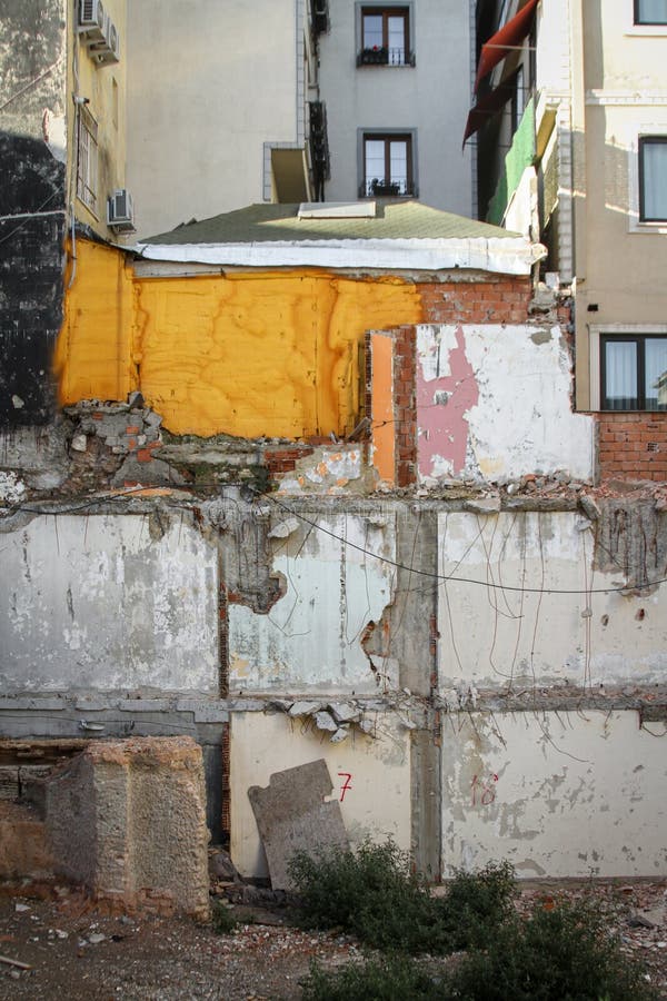 Old Half-demolished Wall of a Building with Paint Peeling Off. Stock ...