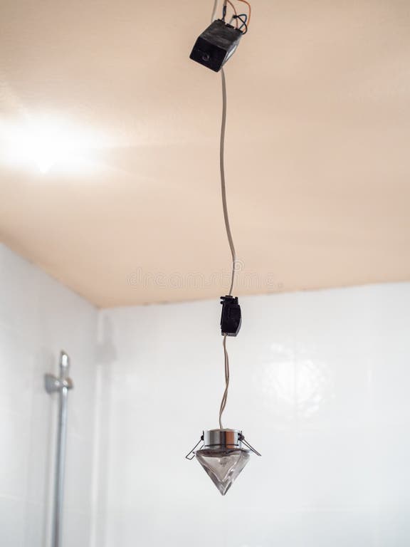 Old Halogen Lamp Hanging on Electric Wires Stock Photo - Image of ...
