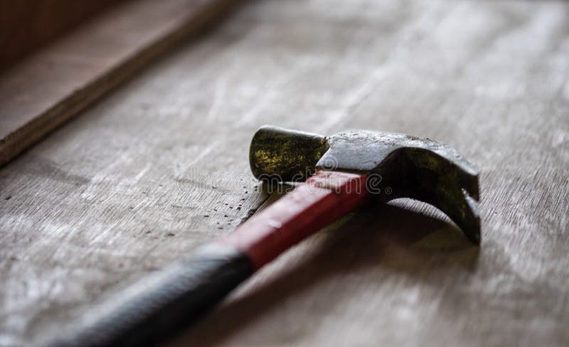 Old hammer on the table. stock photo. Image of handle - 129232002