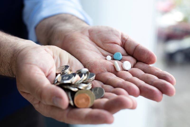 Old Hand Holding Pills and Coins Stock Photo - Image of holding ...