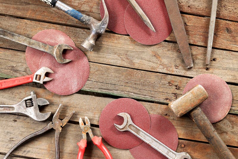 Old Hand Tool on a Wooden Surface. Composition from an Old Rusty Tool ...