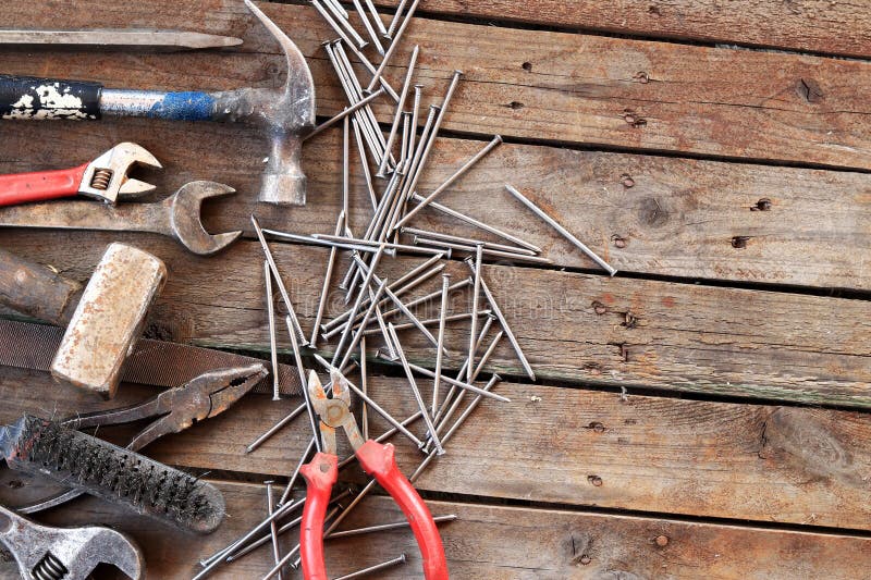Old Hand Tool on a Wooden Surface. Composition from an Old Rusty Tool ...