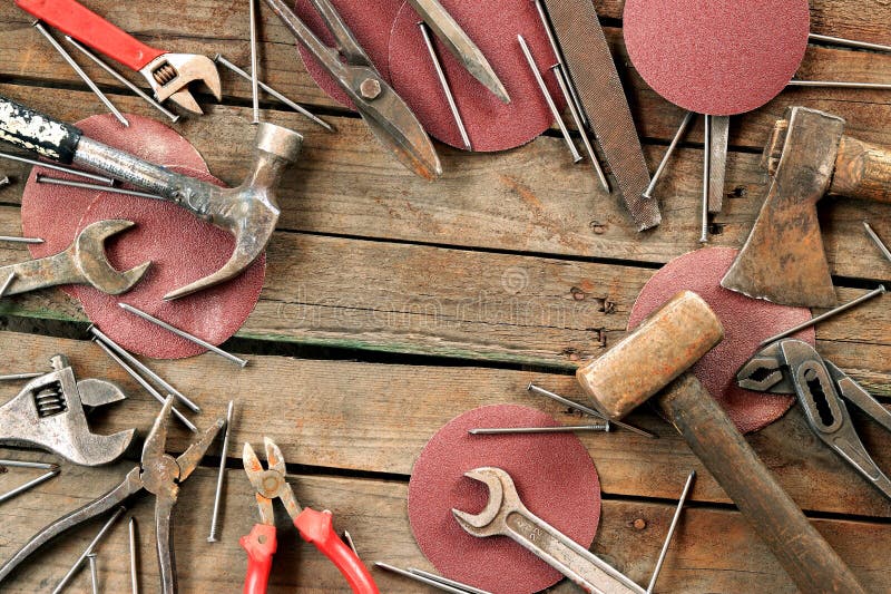 Old Hand Tool on a Wooden Surface. Composition from an Old Rusty Tool ...