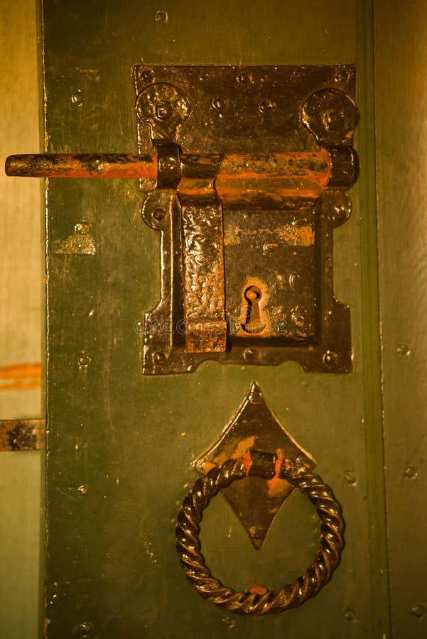 Old Handle and Rusty Lock on an Antique Door Editorial Photography ...