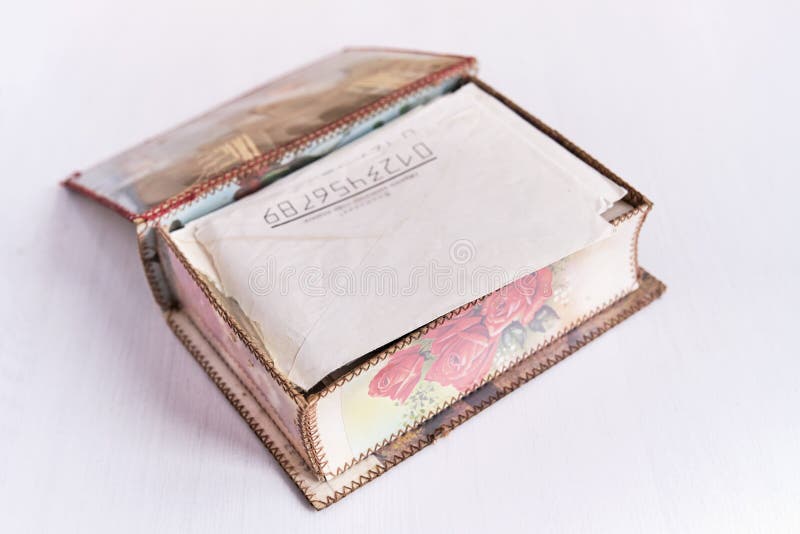 An Old Handmade Cardboard Box with Paper Letters from Yesteryear. Stock ...