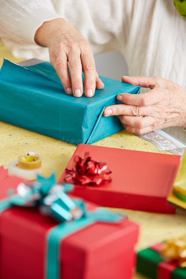 Old hands pack gift stock photo. Image of packing, xmas - 198713440