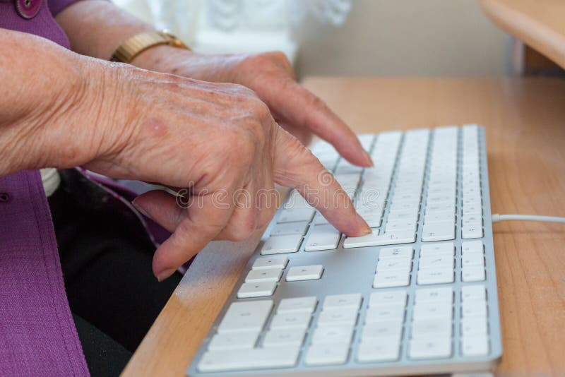 A 95-year-old Woman is Typing on a Laptop Keyboard Stock Image - Image ...