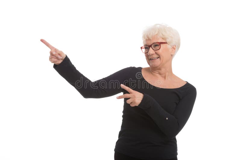 An Old Happy Lady Pointing on a Copy Space. Stock Image - Image of ...