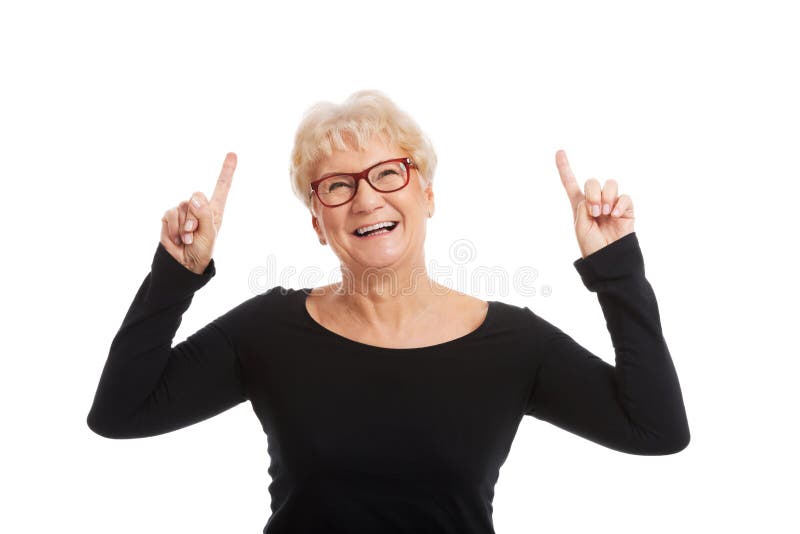 An Old Happy Lady Pointing on a Copy Space. Stock Image - Image of ...