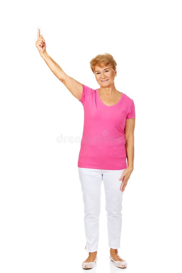 An Old Happy Lady Pointing for Something Stock Photo - Image of ...