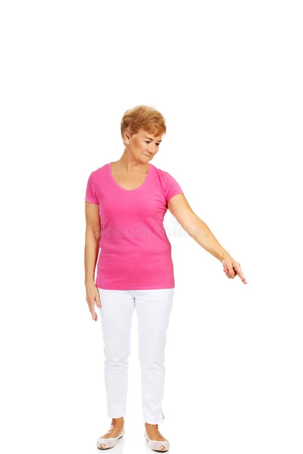 An Old Happy Lady Pointing for Something Stock Image - Image of empty ...