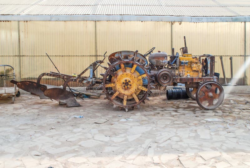 Old Harvesting Rusty Tractor Agriculture Machine without Tires Stock ...