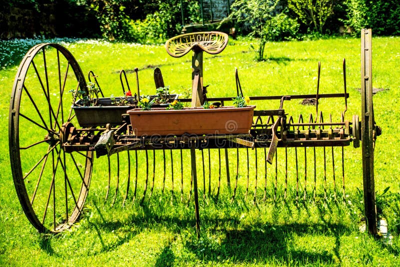 Old hay turning machine stock image. Image of device - 73172795