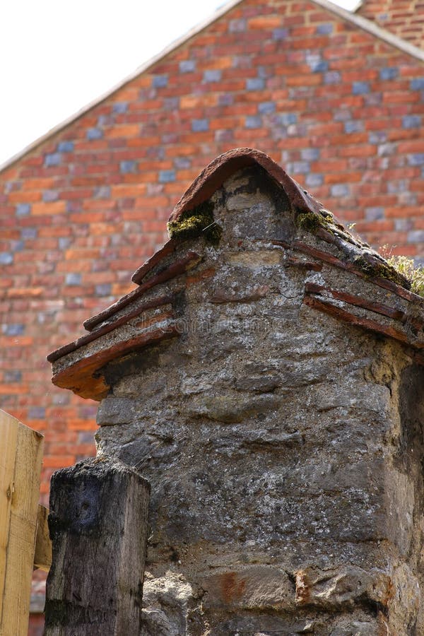 Old high stone fence wall stock photo. Image of detail - 43347084