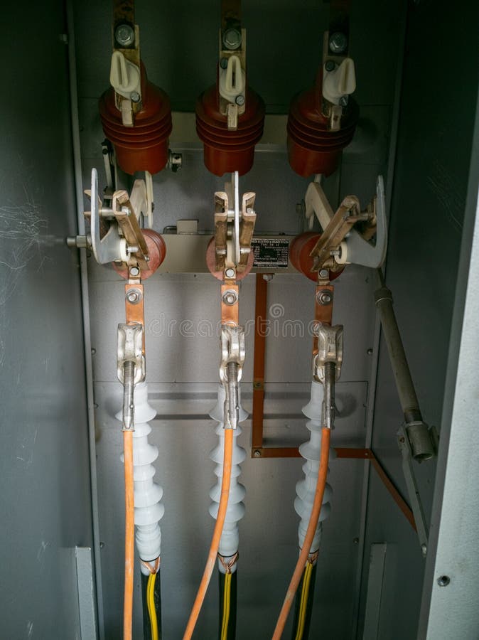Old High Voltage Switch Cell Conected with a Electric Power Cabel Stock ...
