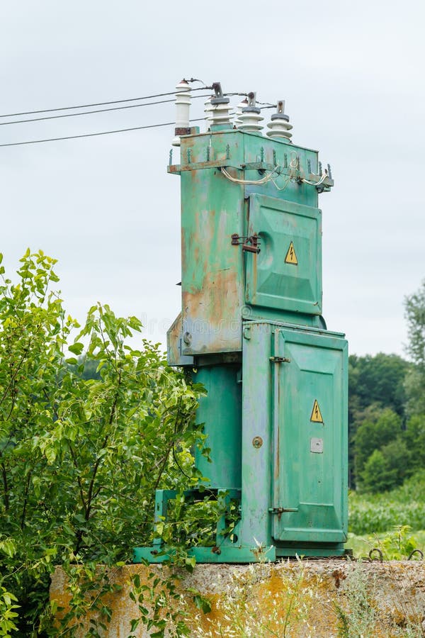 Old High Voltage Transformer and Power Line Stock Photo - Image of ...