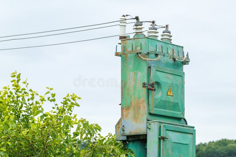 Old High Voltage Transformer and Power Line Stock Photo - Image of ...