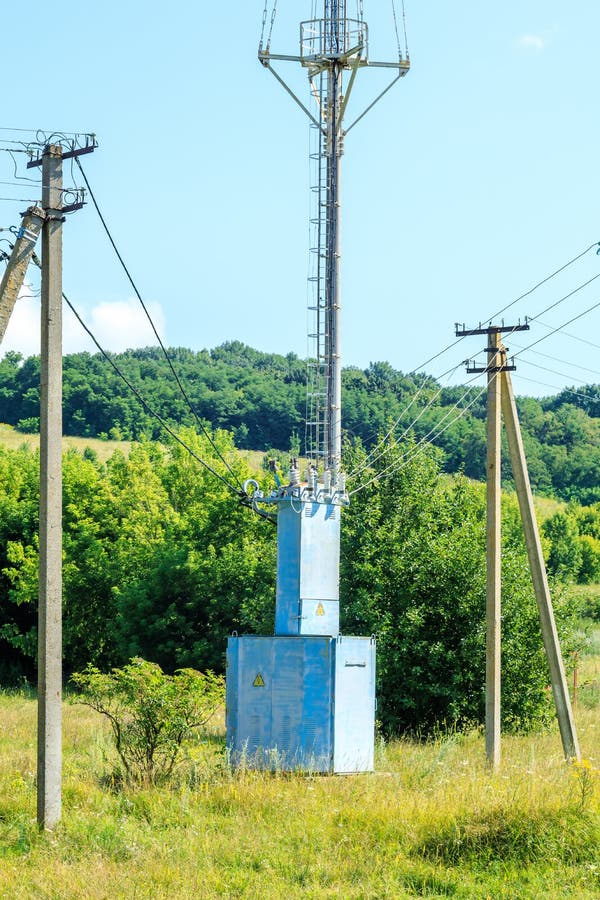Old High Voltage Transformer and Power Line Stock Photo - Image of ...