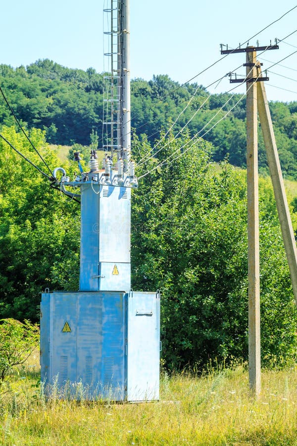 Old High Voltage Transformer and Power Line Stock Photo - Image of ...