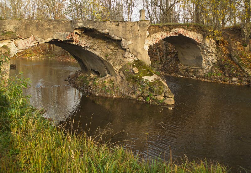 An Old, Historic, Damaged Concrete Bridge in Latvia Stock Image - Image ...