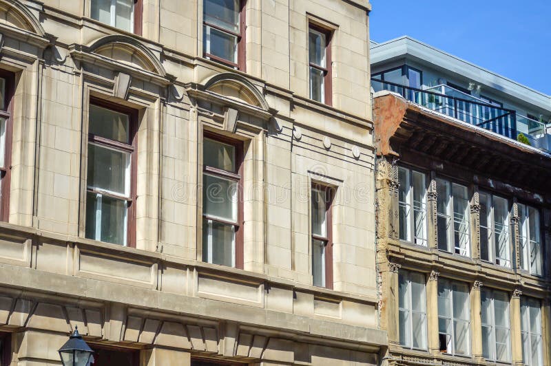 An Old Historical Building with the Large Windows and the Green Roof ...