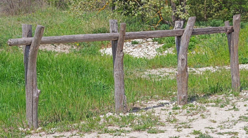A Wooden Hitching Post is Net To Mud and Manure Hole Stock Image ...