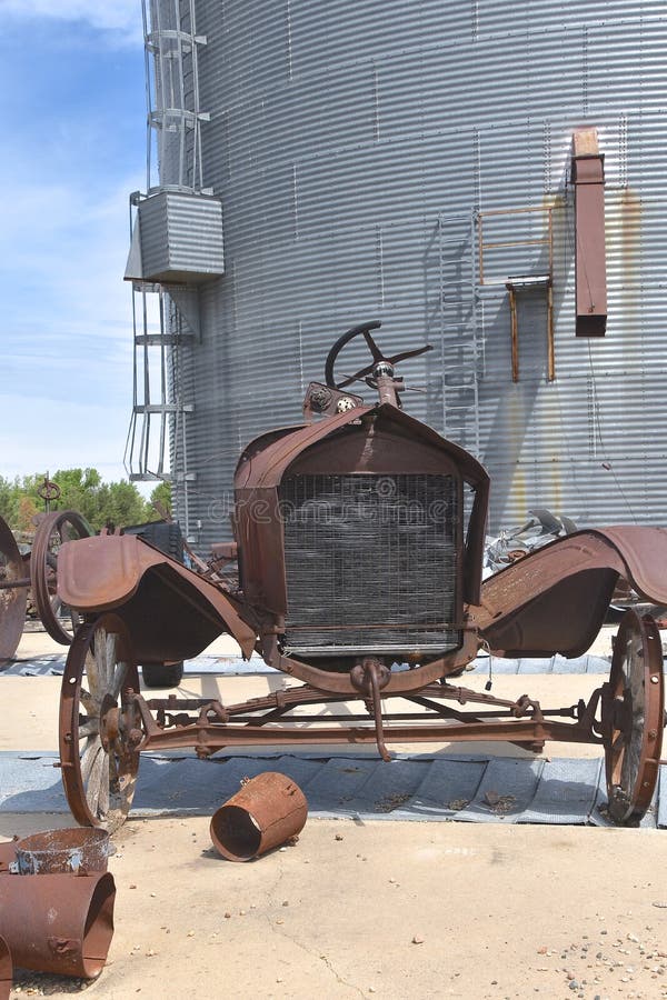 Old Homemade Rusty Car with a Grain Bin Behind Editorial Photography ...