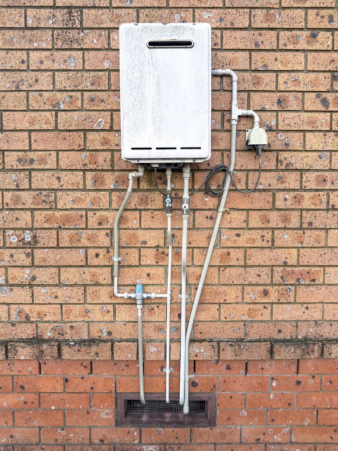 An Old Hot Water Service Mounted on a Wall Stock Photo - Image of ...