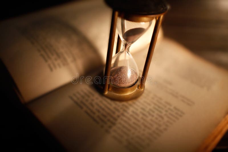 Old Hourglass on Open Ancient Book Stock Photo - Image of learning ...